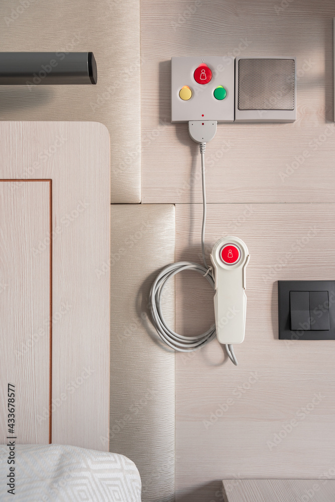 Nurse call system with emergency buttons installed near bed in medical ...