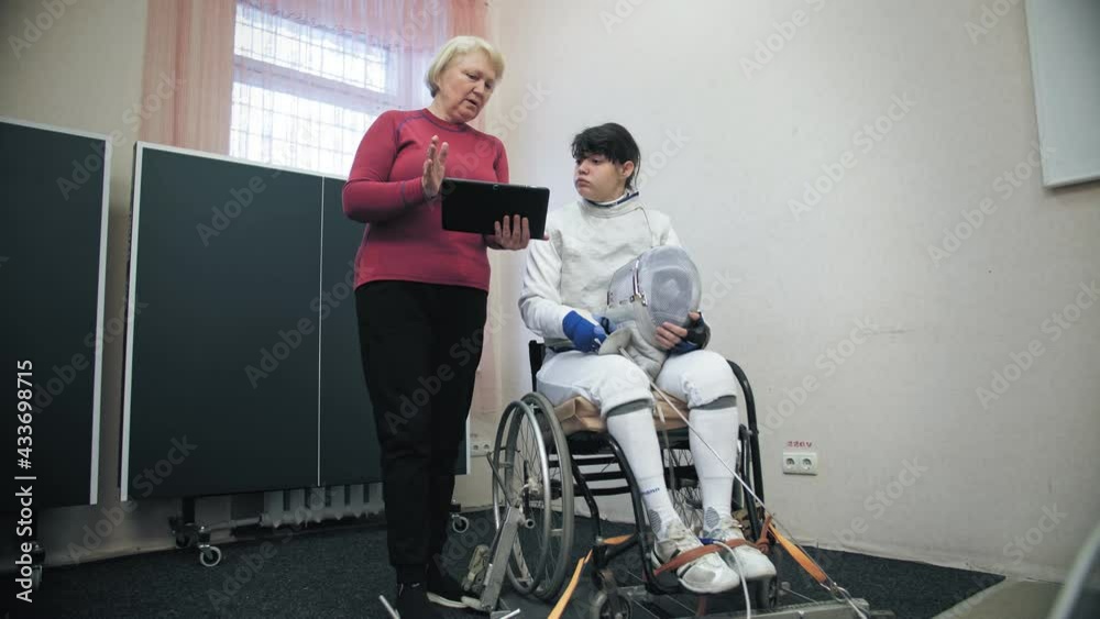disabled athlete. fencing. workout of wheelchair fencing athletes with ...