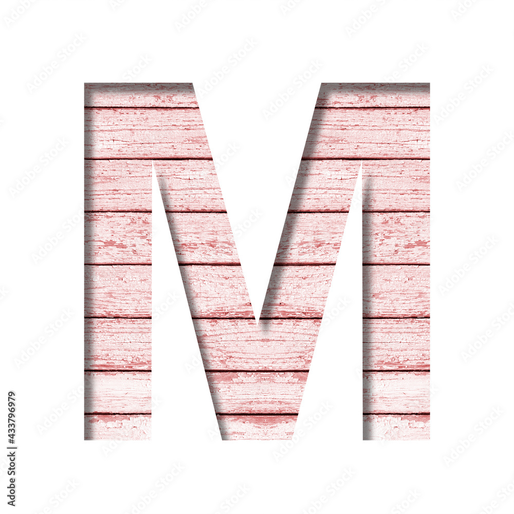 Font on boards with old paint. The letter M cut out of paper on a ...