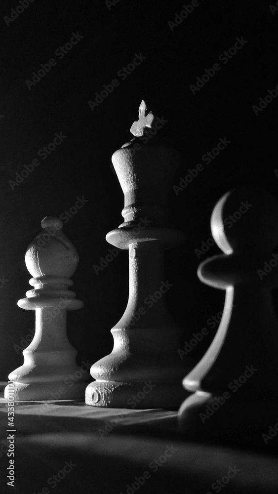 photographing chess pieces with light and shadow Stock Photo | Adobe Stock
