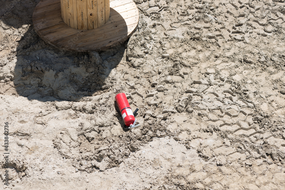 Foto de large wooden wire or cable spool and discarded fire ...