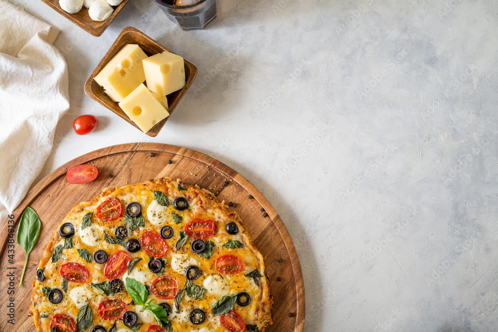 Pizza. View from above. Located on a beautiful platter. The vibrant ...