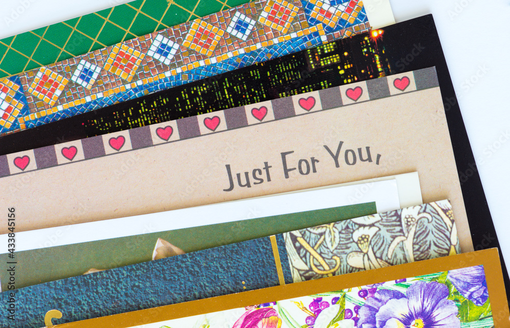 pile of greeting cards with the words: Just For You at the centre Stock ...