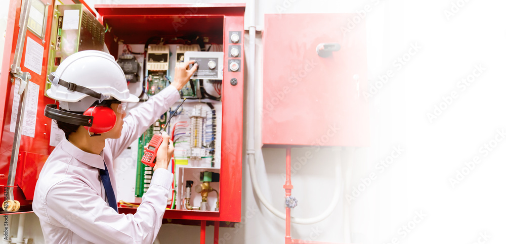 Engineer checking Industrial fire control system,Fire Alarm controller ...