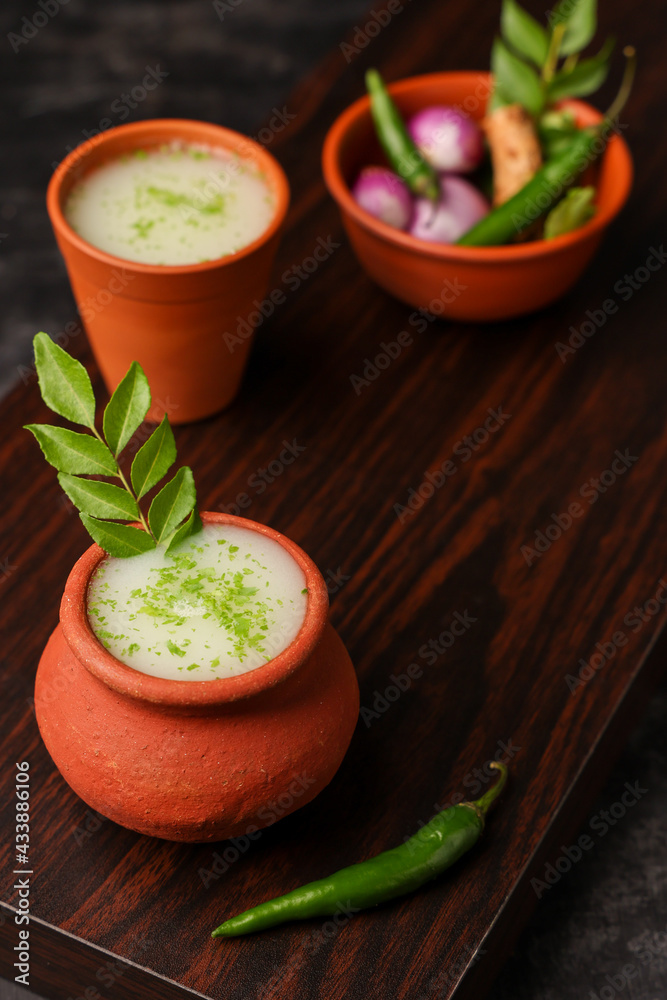 Spiced buttermilk in clay pot , chaas , chaach , moru , sambharam ...