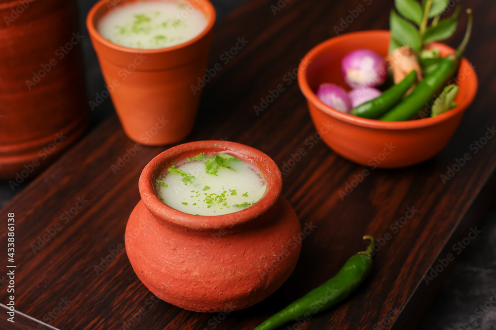 Spiced buttermilk in clay pot , chaas , chaach , moru , sambharam ...