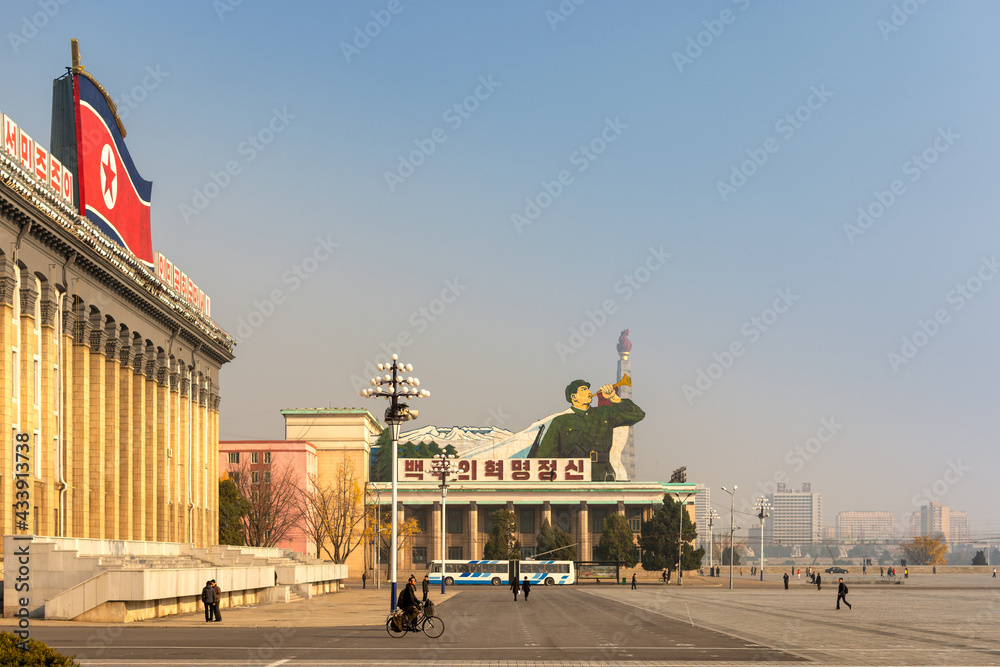 Kim Il-sung Square and government buildings decorated with flags and ...