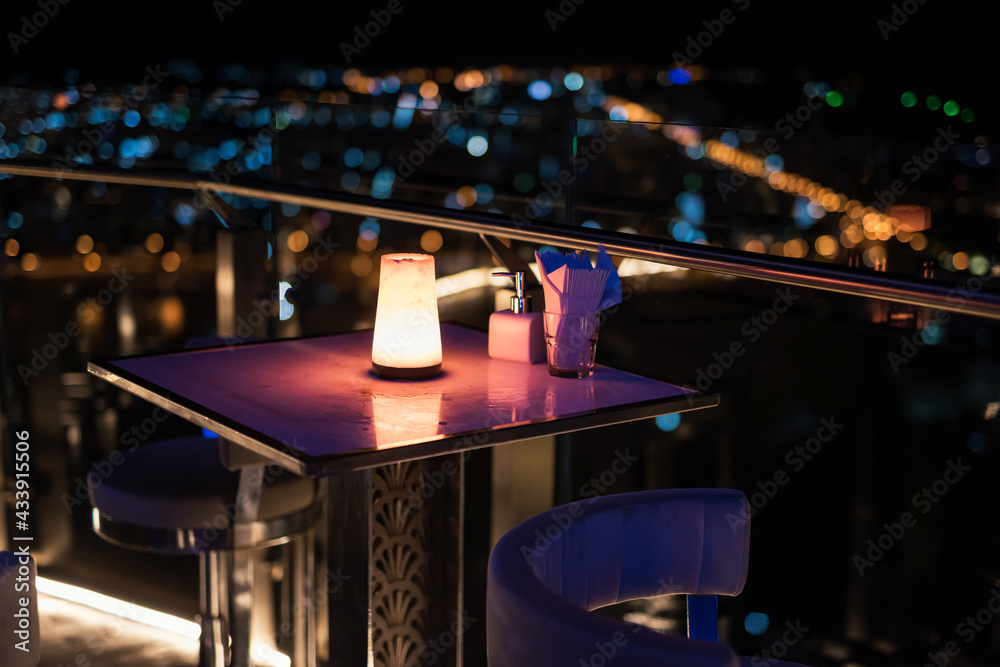 Rooftop table of pub and restaurant with cityscape view Stock Photo ...