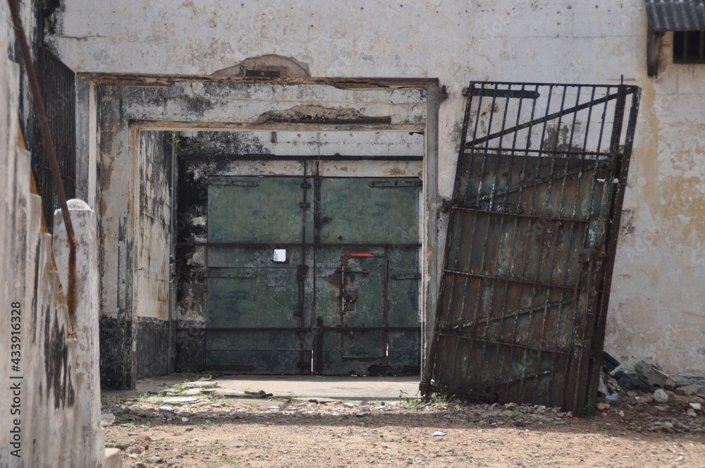 Gate of an abandoned prison in the former Ussher Fort in Accra, Ghana ...