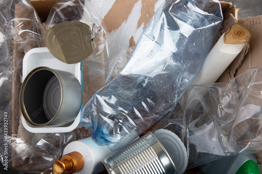 Recycling and ecology concept. Sorting household waste - plastic, paper ...