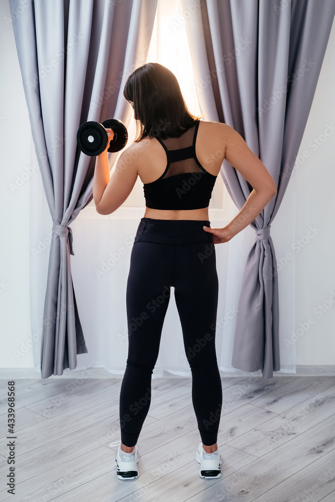 Weight fitness. Athletic woman. Bodybuilding gym. Home training ...