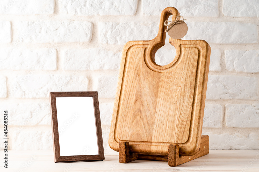 Blank, empty frame mockup Modern template. empty wooden cutting board ...