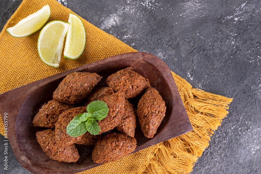 Traditional Arabian fried snack made with wheat and stuffed with minced ...