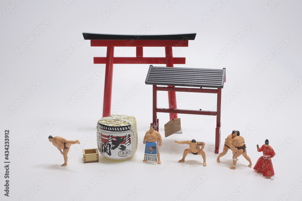 the mini sumo with the Japanese Sake Barrels Stock Photo | Adobe Stock