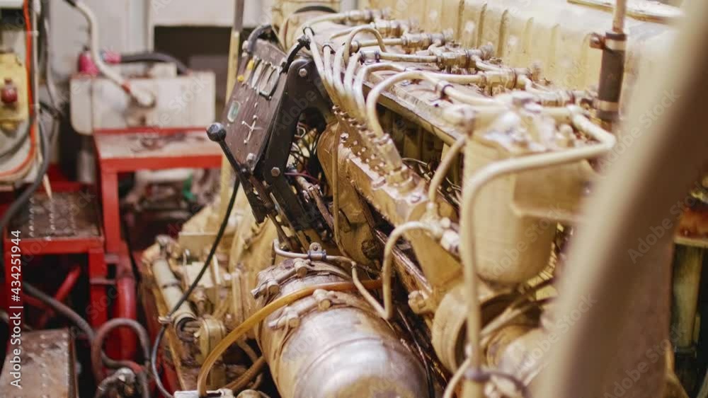 Soviet tank diesel engine in engine room of old tug. Water transport ...