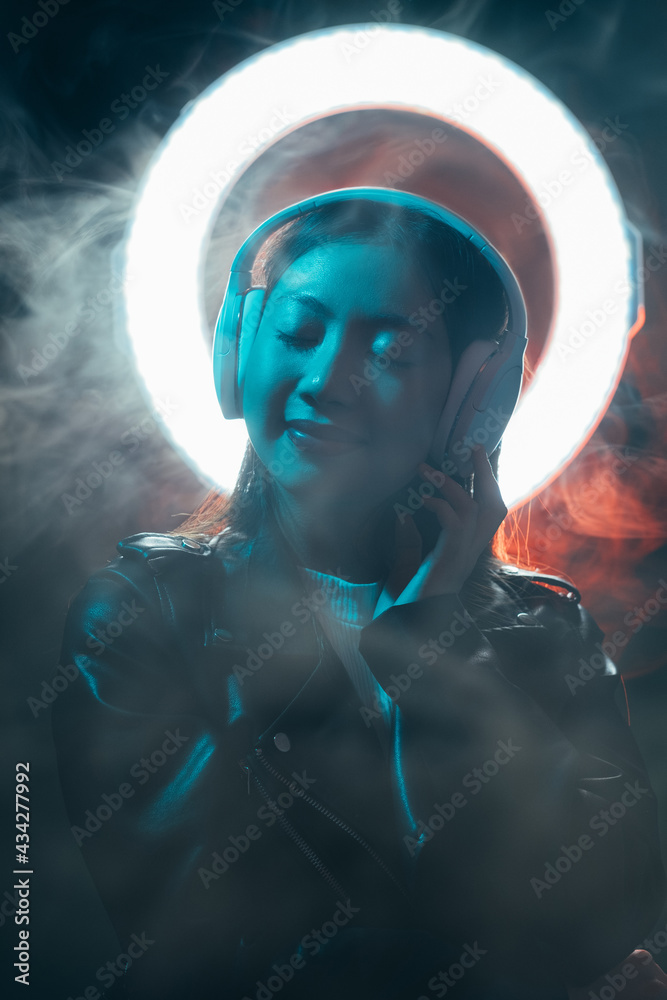 Music inspiration. Cyberpunk neon girl. Innovative technology. Blue red ...