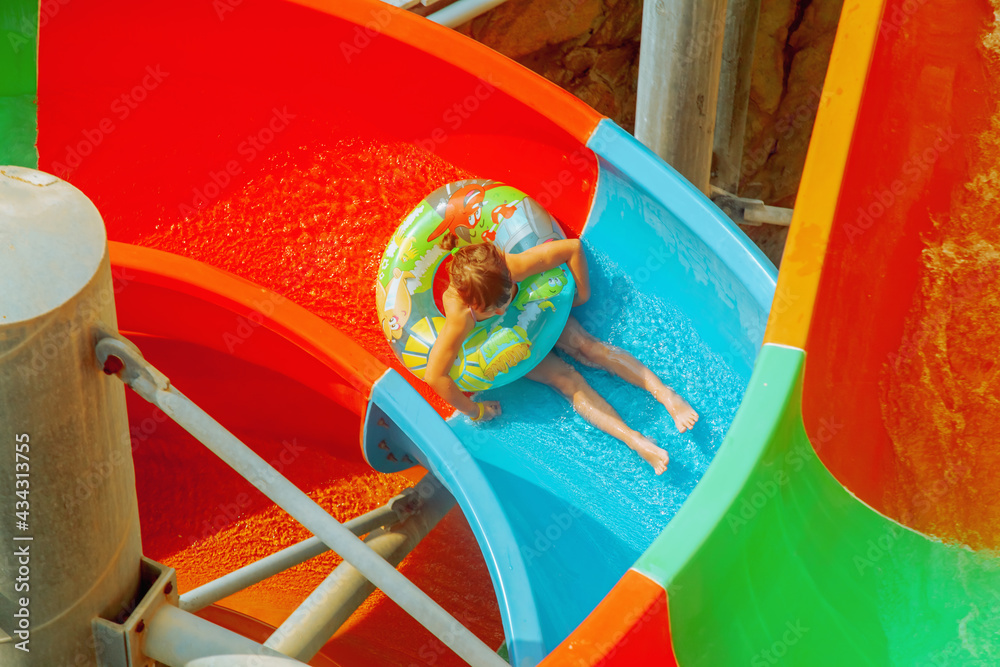 Summer holiday and leisure concept. Top view of cute young child girl ...