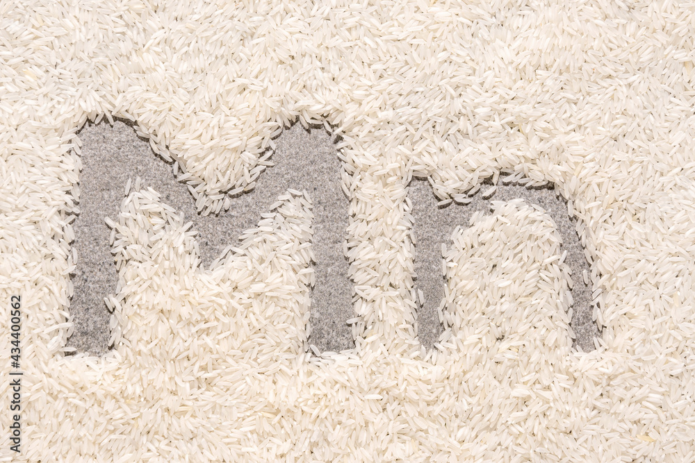 Polished white rice texture with text Mn (manganese). Basmati as a ...