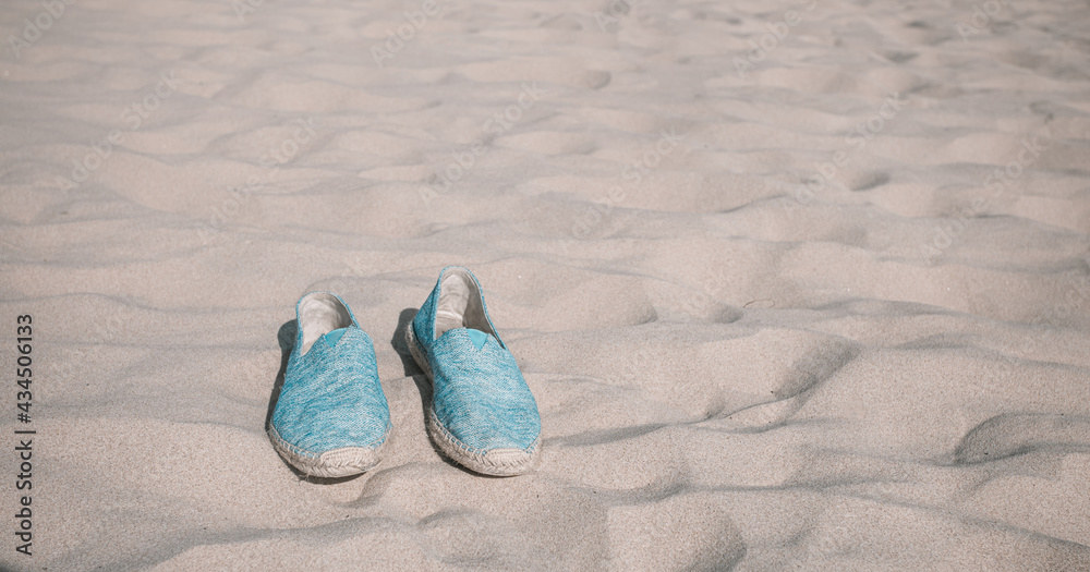 beach shoes. sand background on the beach. summer vacation beach ...