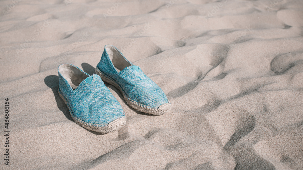 beach shoes. sand background on the beach. summer vacation beach ...