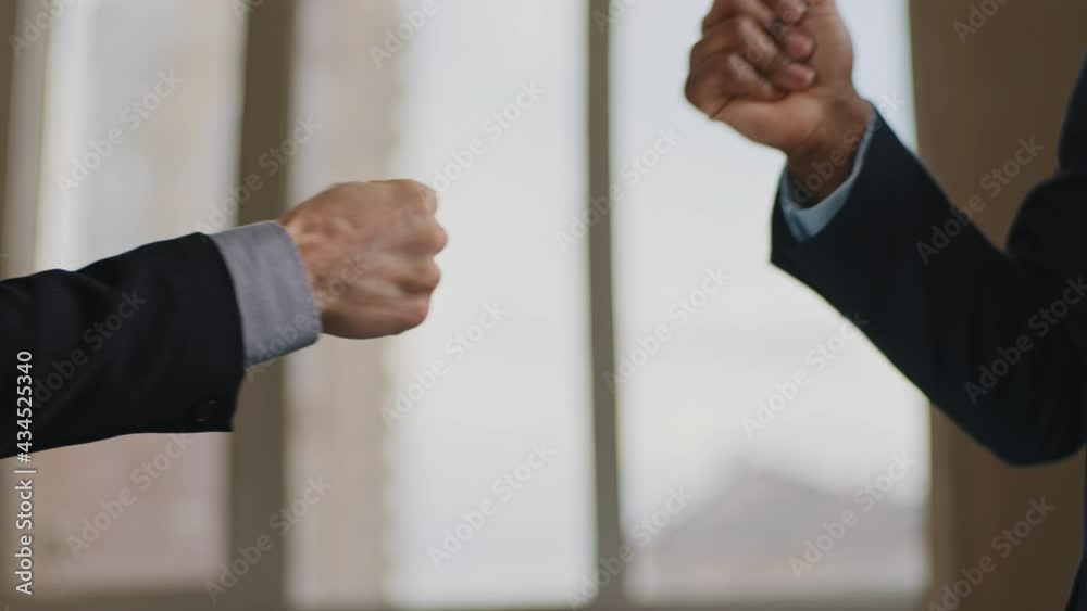 Vidéo Stock Close-up male workers in formal suits making unusual funny ...