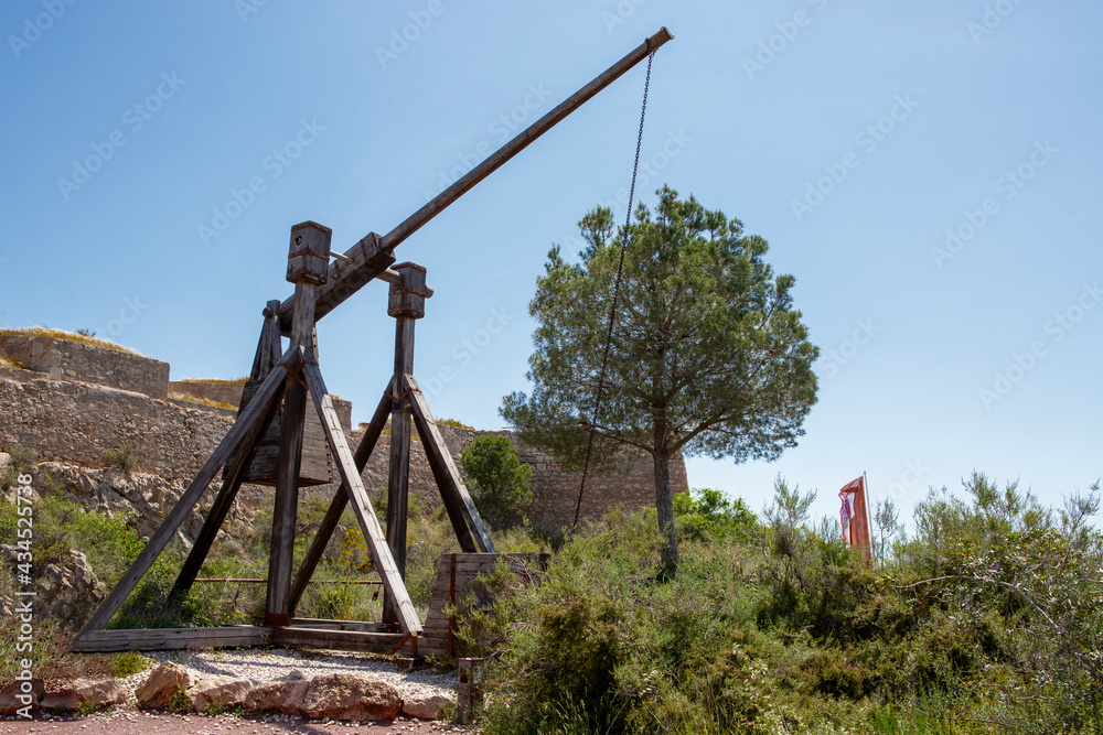 Medieval catapult in the castle of Lorca, Murcia, Spain. Military ...