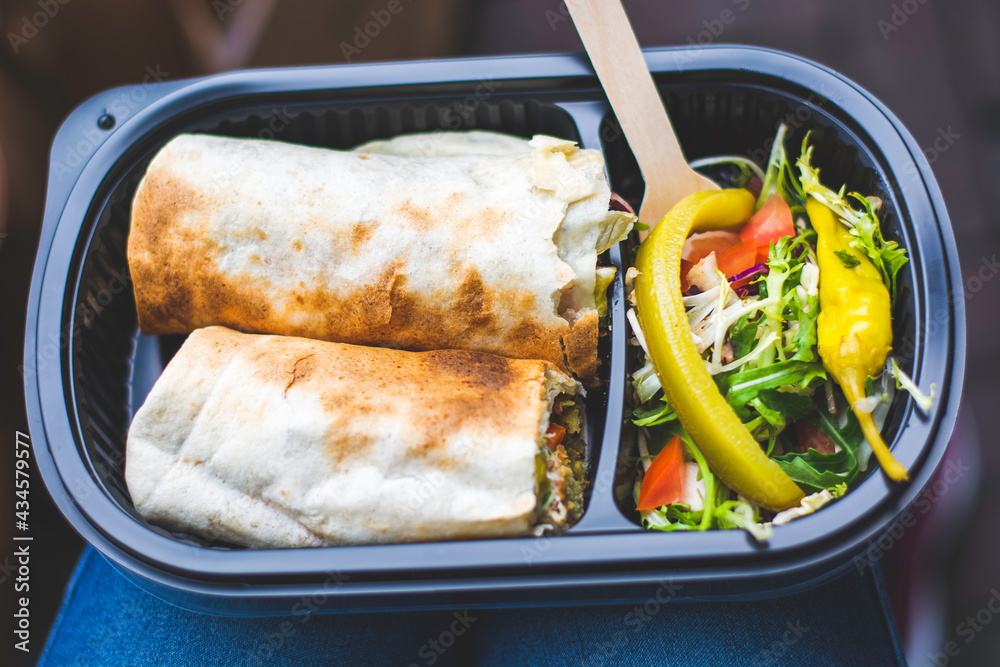 Healthy falafel wraps with salad, meal in take away plastic box, vegan ...