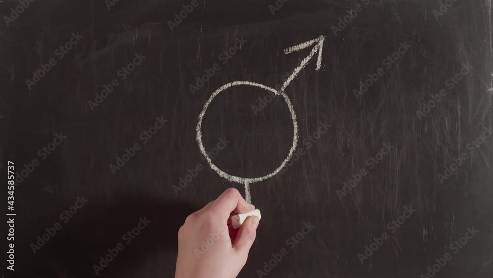Gender equality sign is drawn on a chalkboard, timelapse. Gender ...