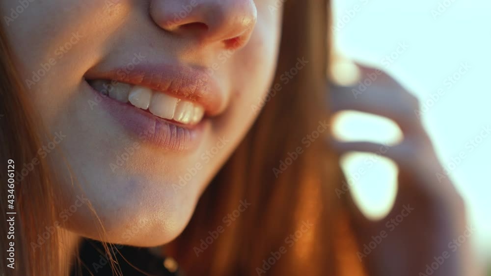 Girl face at sunset. Girl of dreaming. Lips smile. Girl face in wind ...