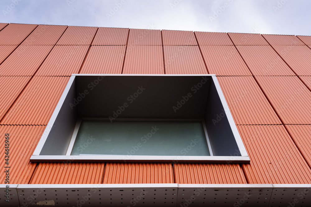 Detail of window with aluminum frame in ceramic ventilated facade ...