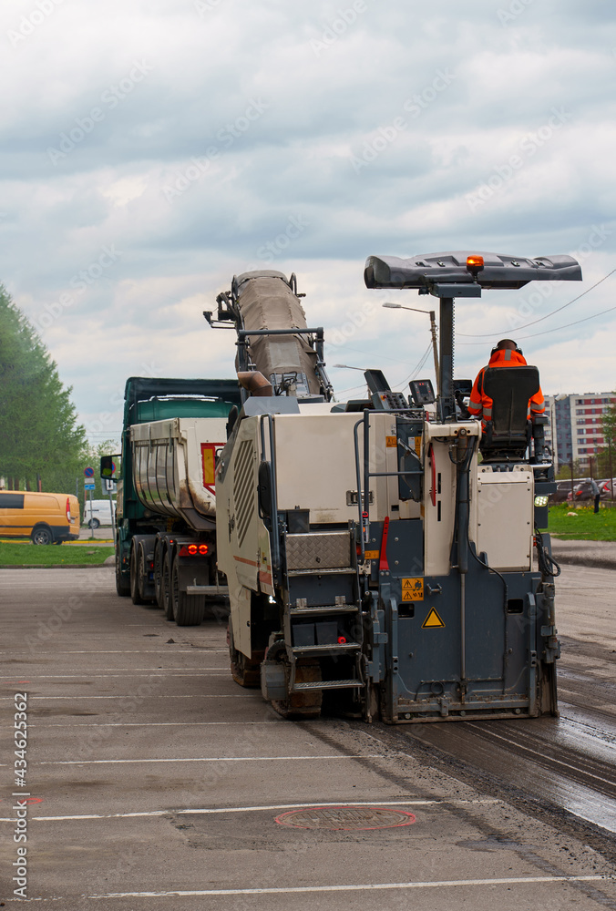 Asphalt milling machine working on the street. Pavement milling. Stock ...