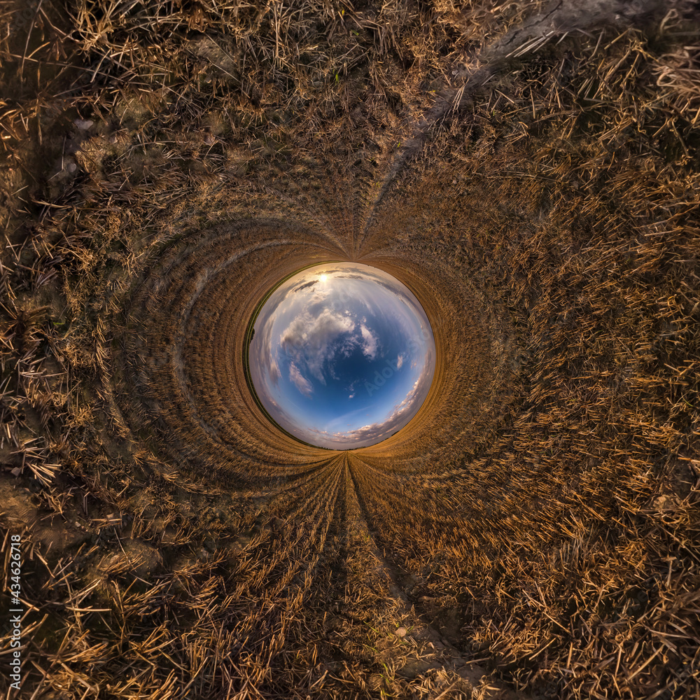 blue sky ball in middle of swirling field. Inversion of tiny planet ...