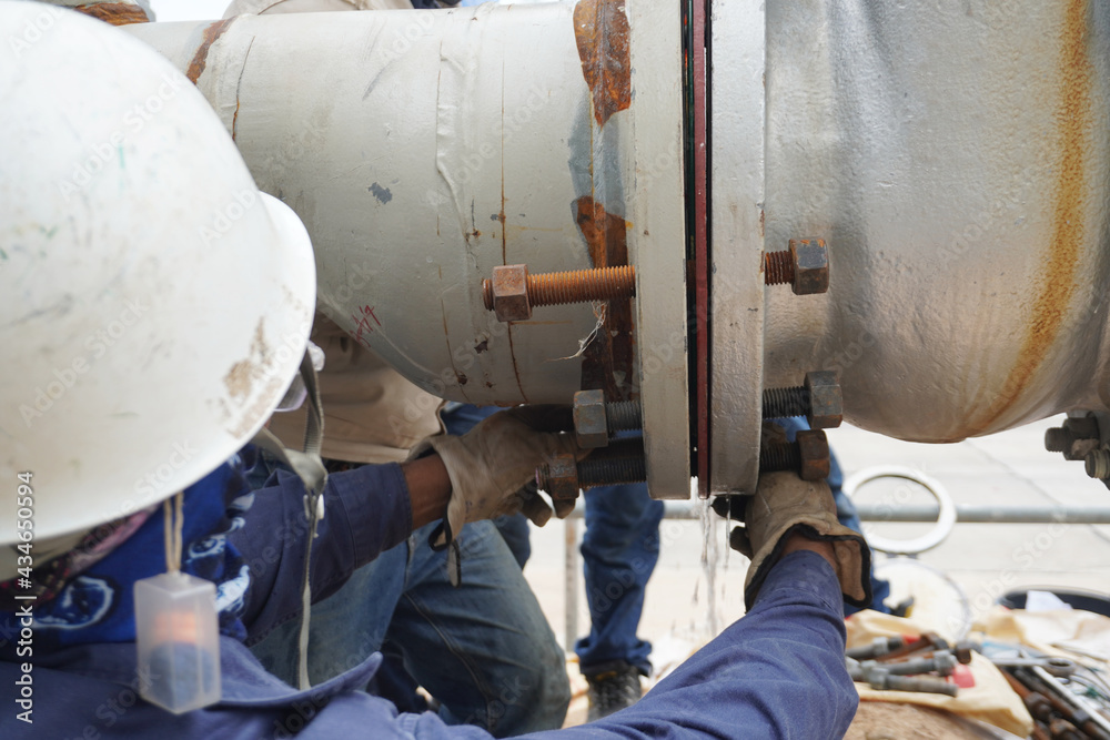 Pipeline system during installation by the construction workers in the ...