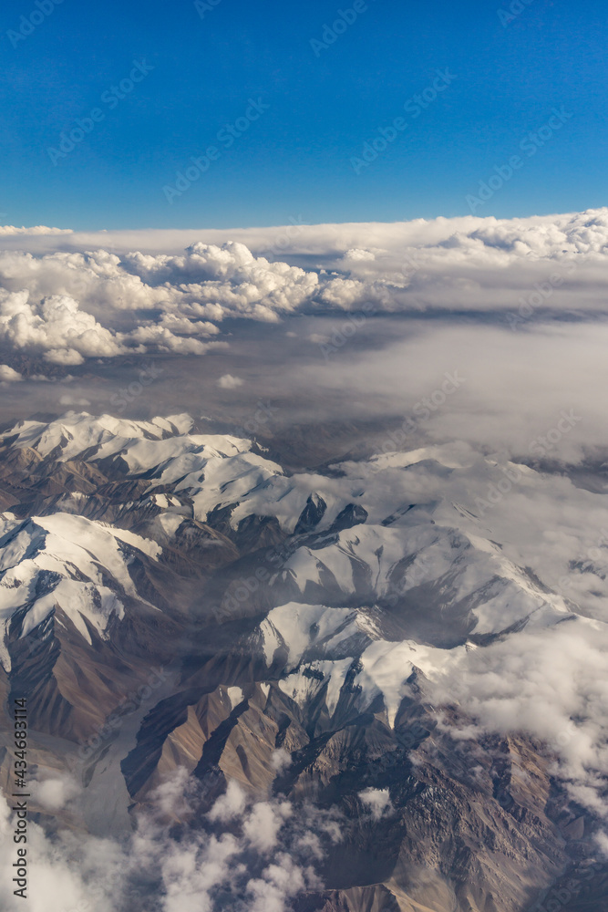 Photo & Art Print Aerial photos of mountains and snow mountains in ...