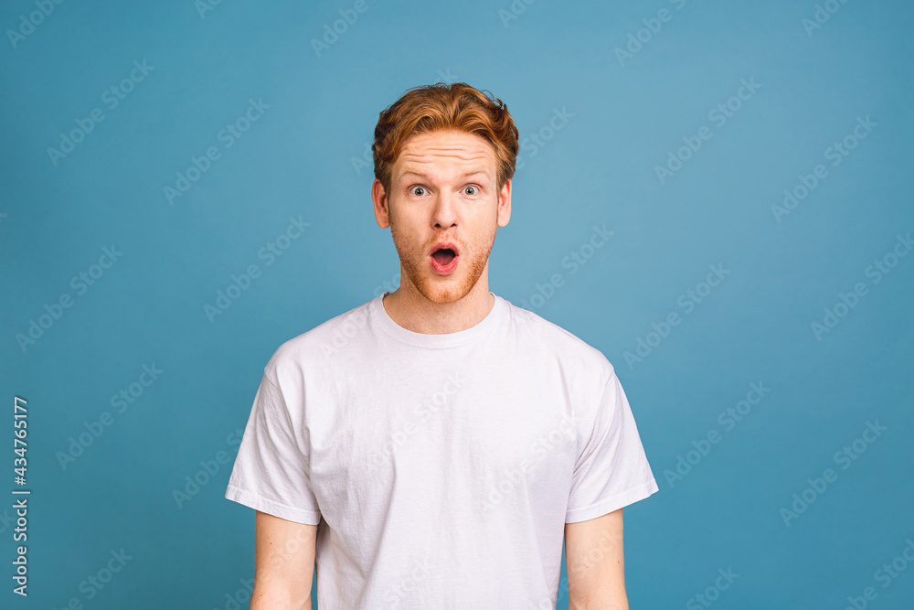 OMG! It's incredible! Portrait of amazed shocked young man looking at ...