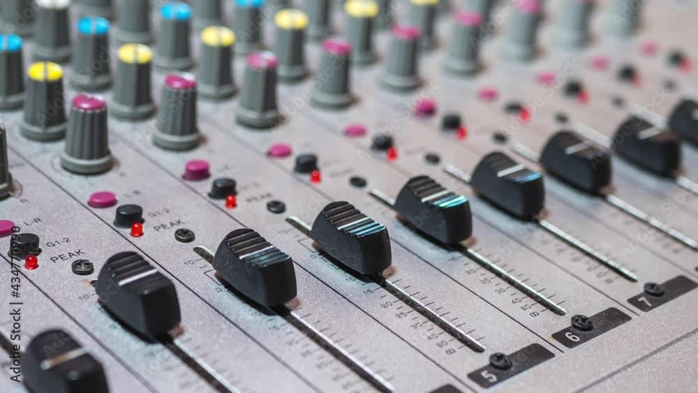 Moving sliders on audio mixer in a recording studio. Time lapse ...