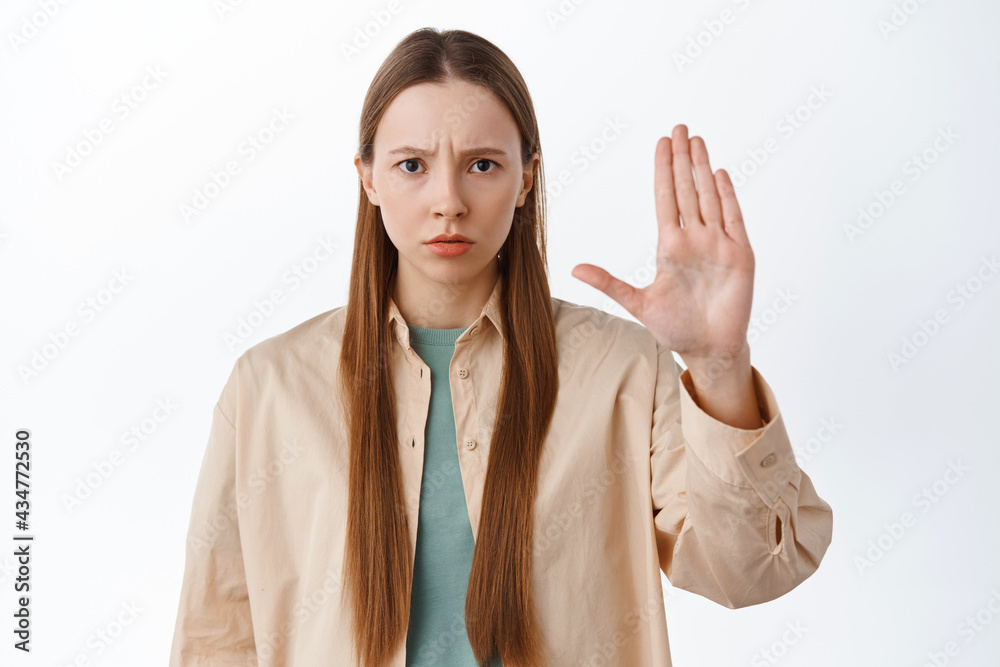 Angry teenage girl raise hand in block, tell to stop, keep social ...