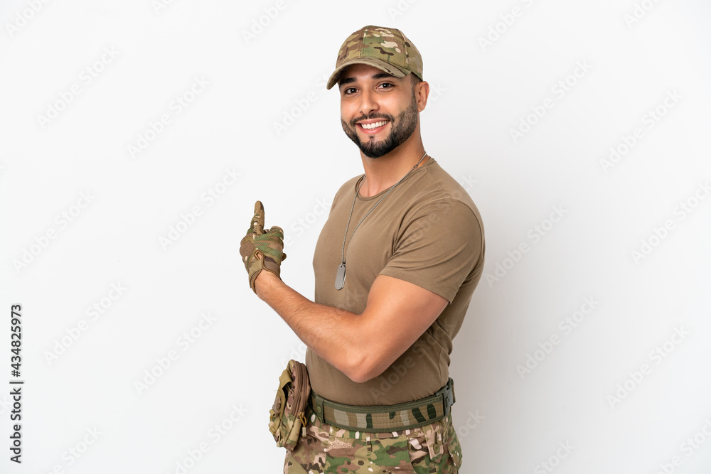 Young arab soldier man isolated on white background pointing back Stock ...