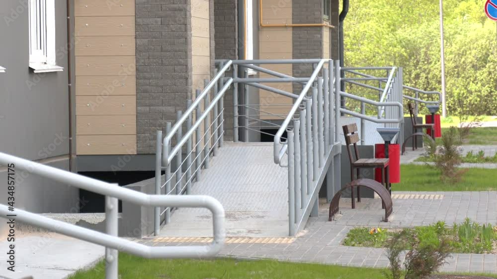 Building entrance with ramp for disabled person wheelcha. Ramp for ...