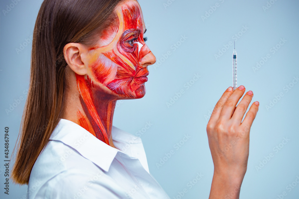 Cosmetic injection in the face. Young woman with half of face with ...