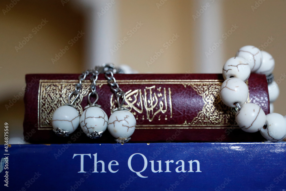 Prayer beads ( misbaha ) with Quran in arabic and english. United Arab ...