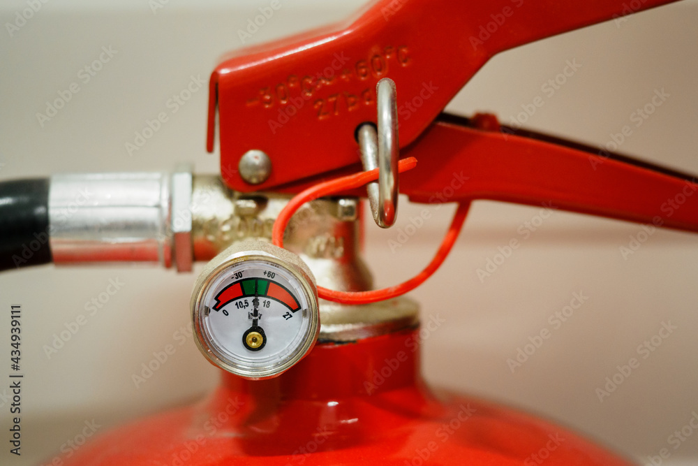 Pressure gauge on the fire extinguisher. Stock Photo | Adobe Stock Pressure gauge on the fire extinguisher. Stock Photo | Adobe Stock