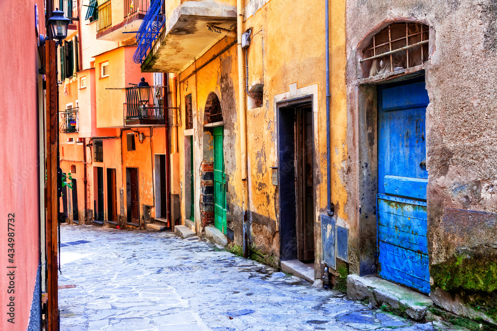 Charming streets of old italian villages (towns) with floral pots and ...
