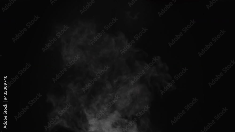Swirling Steam Over a Hot Plate. White steam rises in an active stream ...