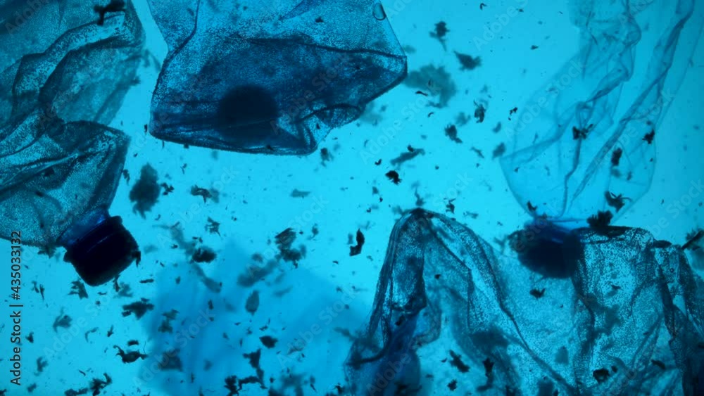 Underwater footage of plastic pollution problem concept in ocean. Stock ...