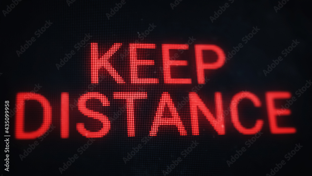 Keep distance warning banner. Red pixel text on old dusty screen ...