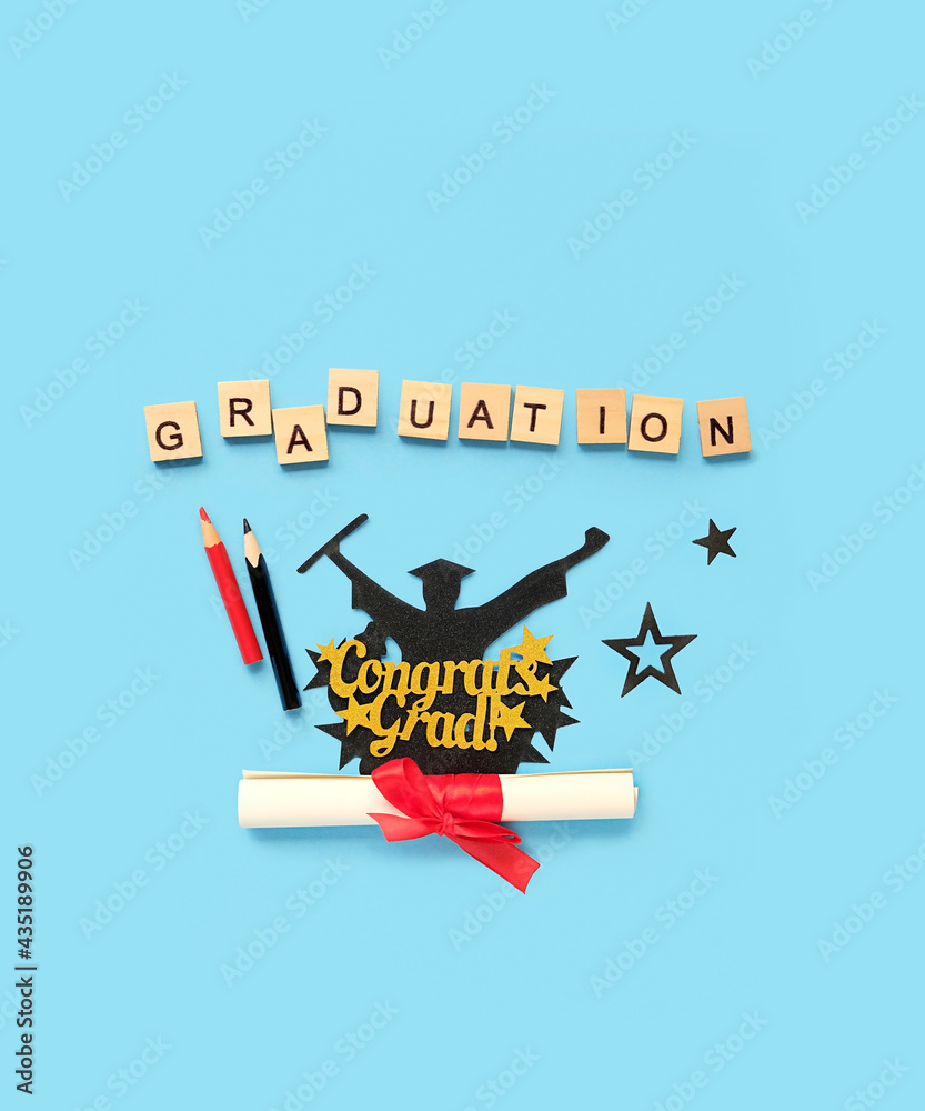 Graduation diploma, letters and pencils on blue background. Degree day ...