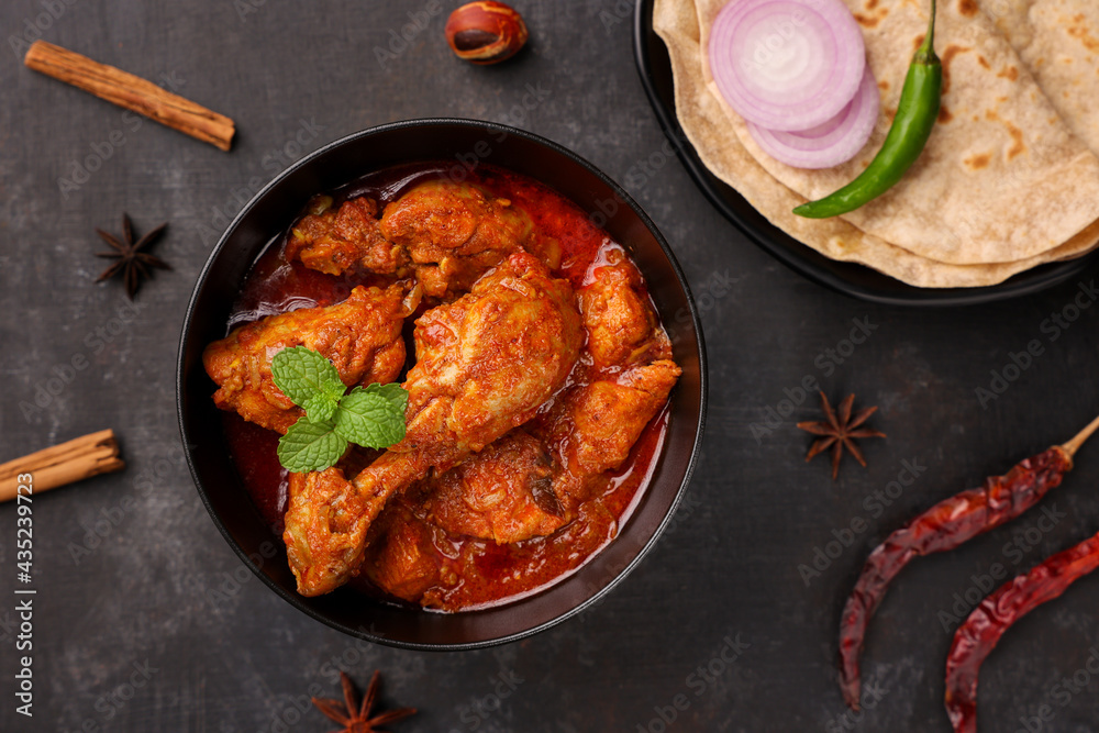 Spicy red chicken curry. Goan style chicken vindaloo. Butter chicken ...