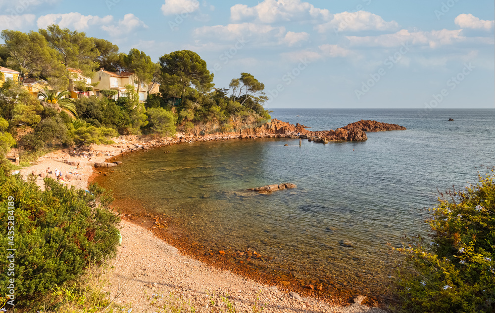 Cozy bay on the mediterranean red rocks coast, beach near Saint Raphael ...