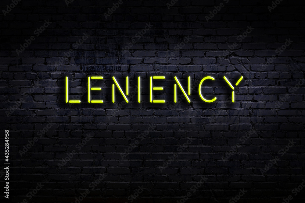Poster Neon sign. Word leniency against brick wall. Night view – Wall ...